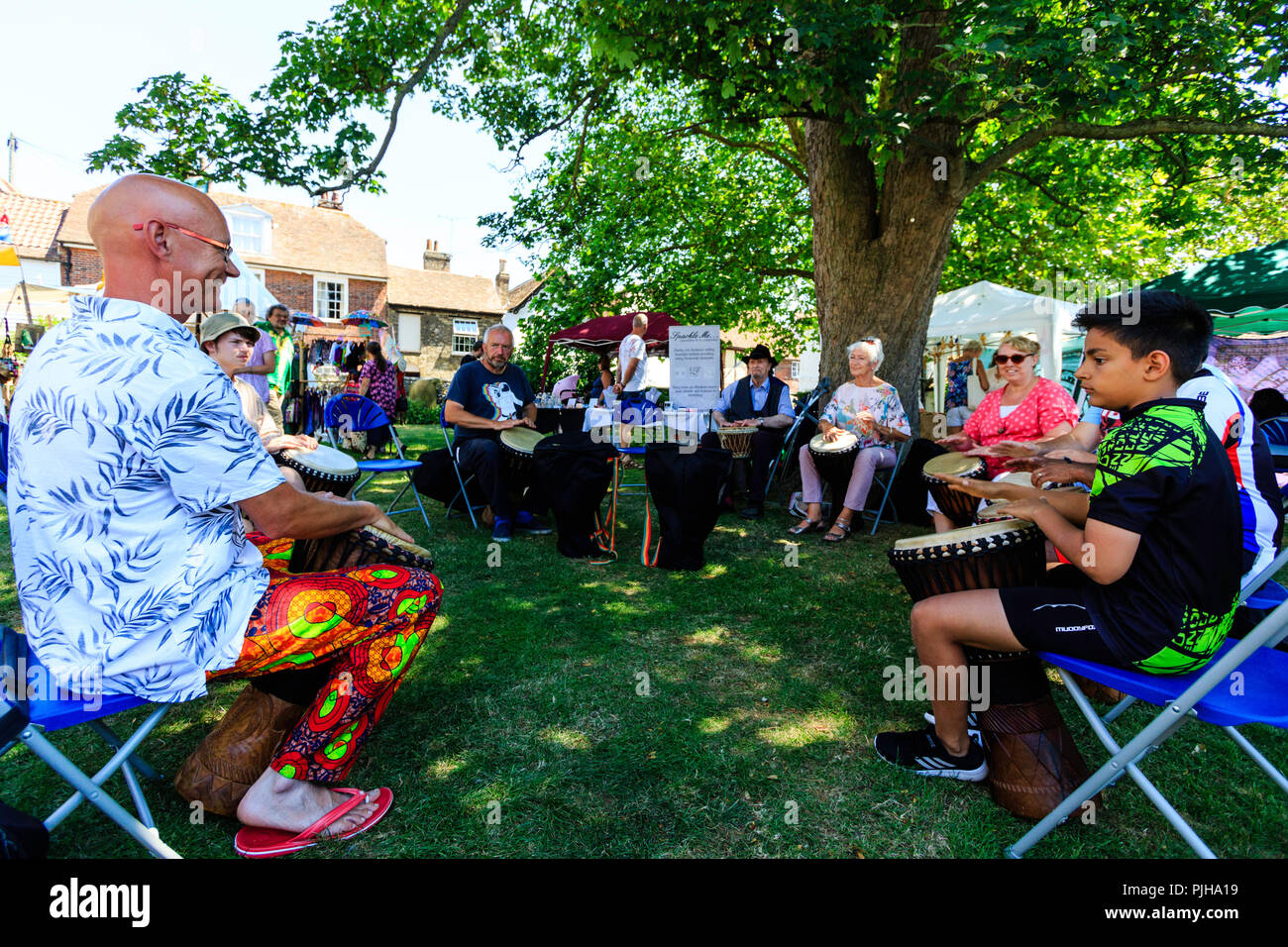 Caucasian 40s male, Richard Latham, Rich Rhythms, drummer leading an ...