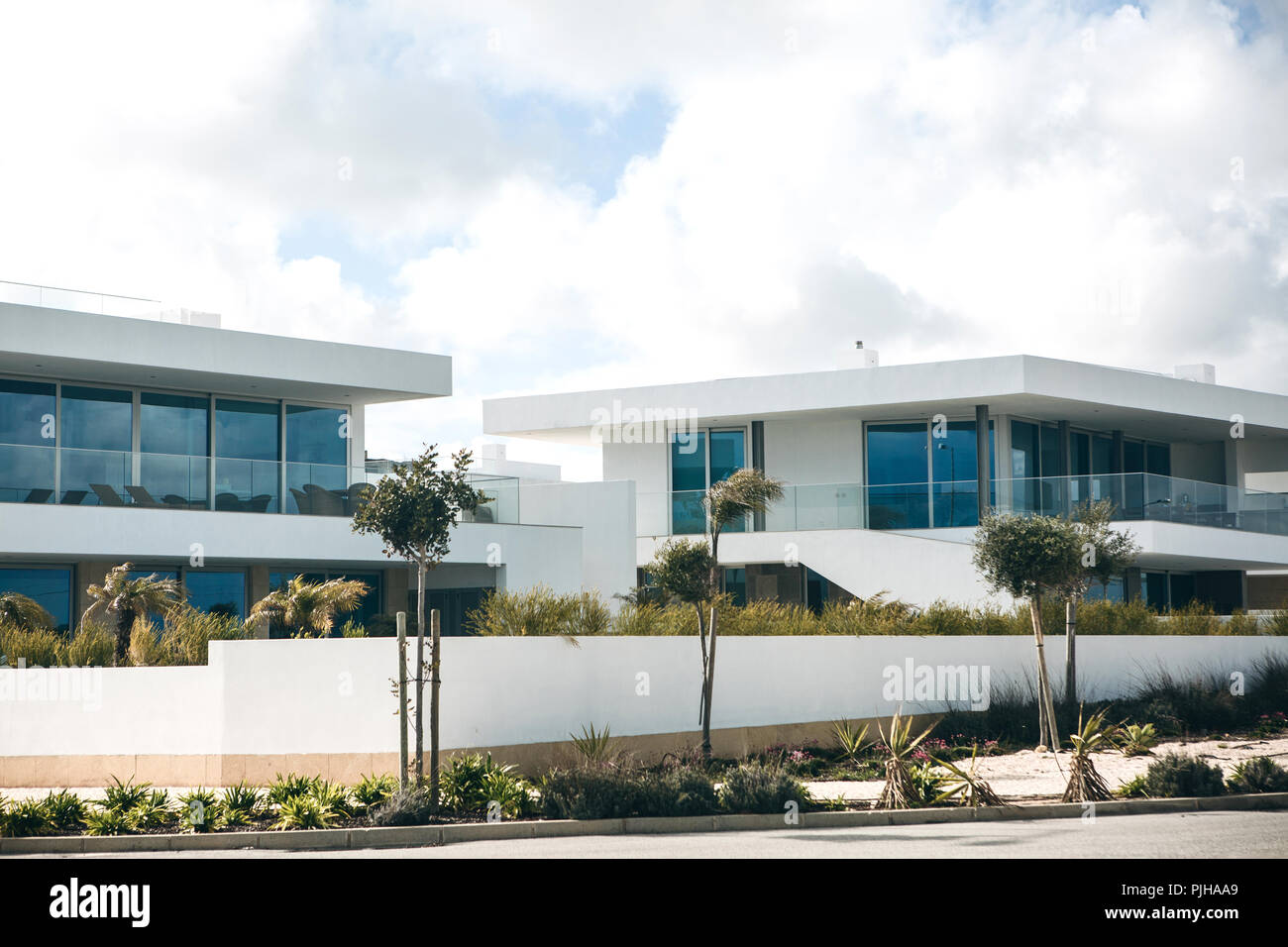 White residential building in the south of Portugal against the blue ...