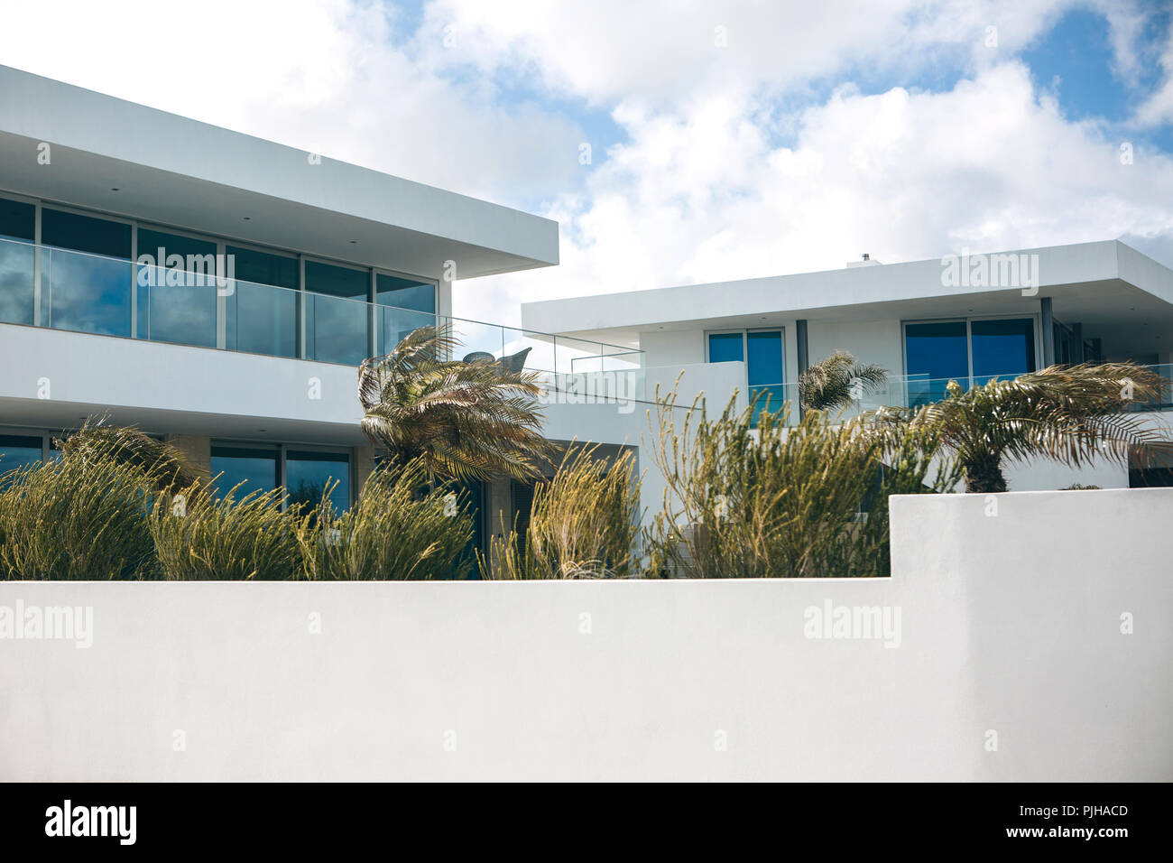White residential building in the south of Portugal against the blue ...