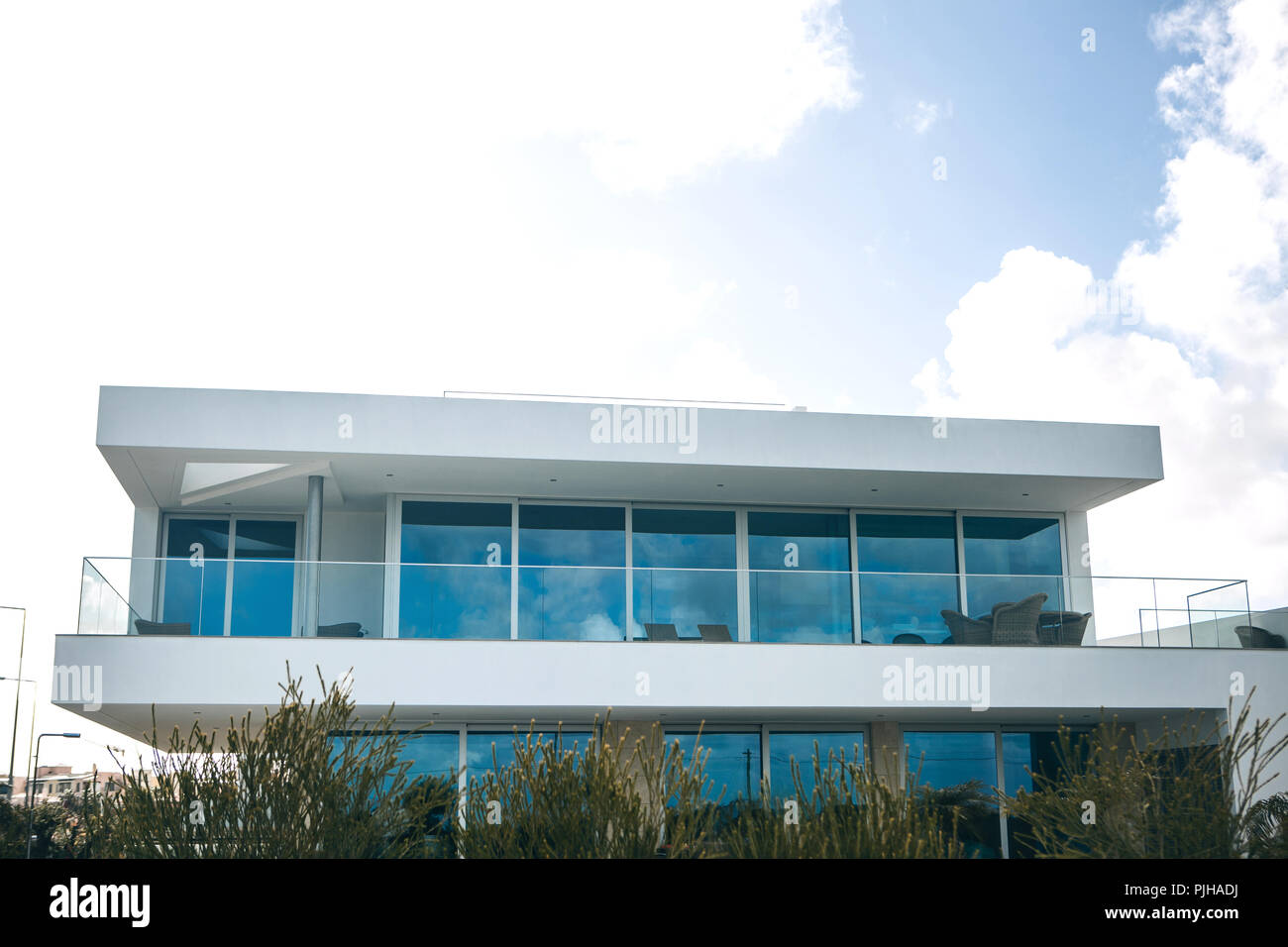 White residential building in the south of Portugal against the blue ...