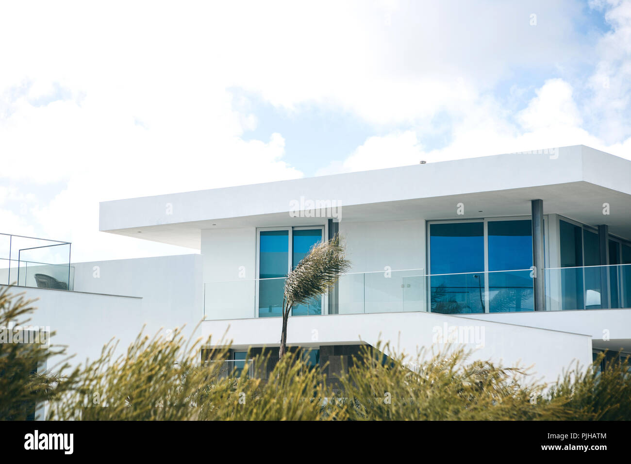 White residential building in the south of Portugal against the blue ...