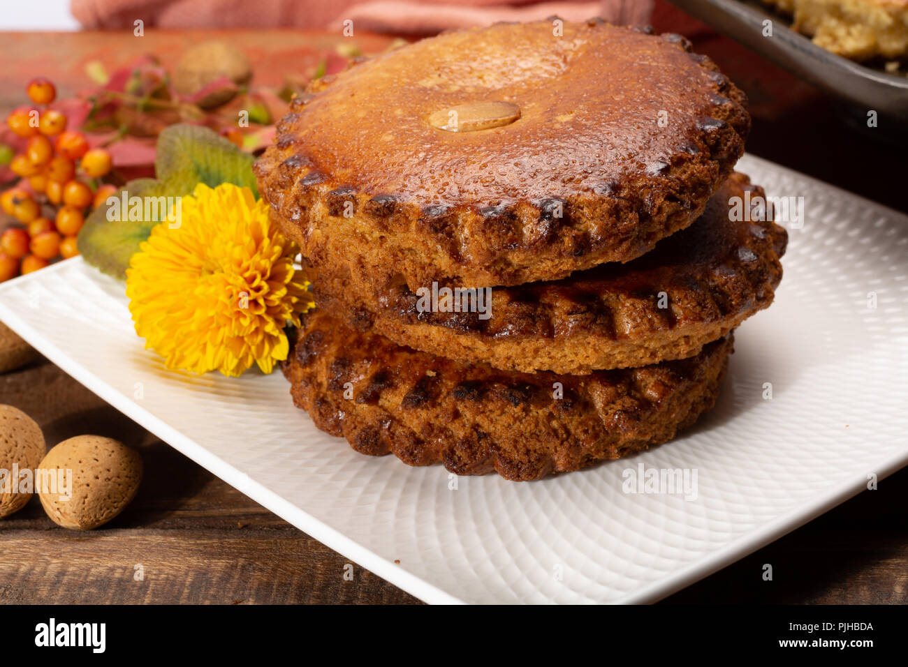 Round Dutch homemade cookies filled with marzipan and almonds nuts ...