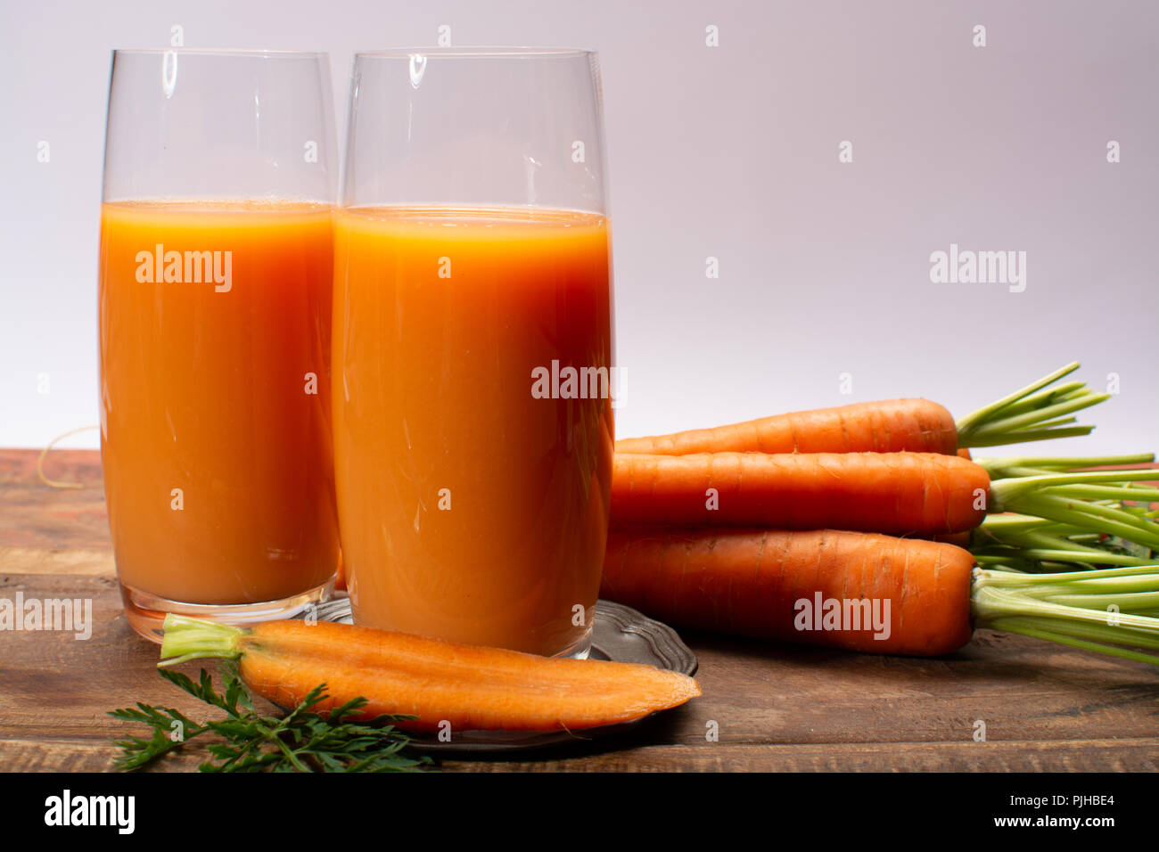 Tasty healthy natural sweet vegetable drink, fresh organic carrot juice ...