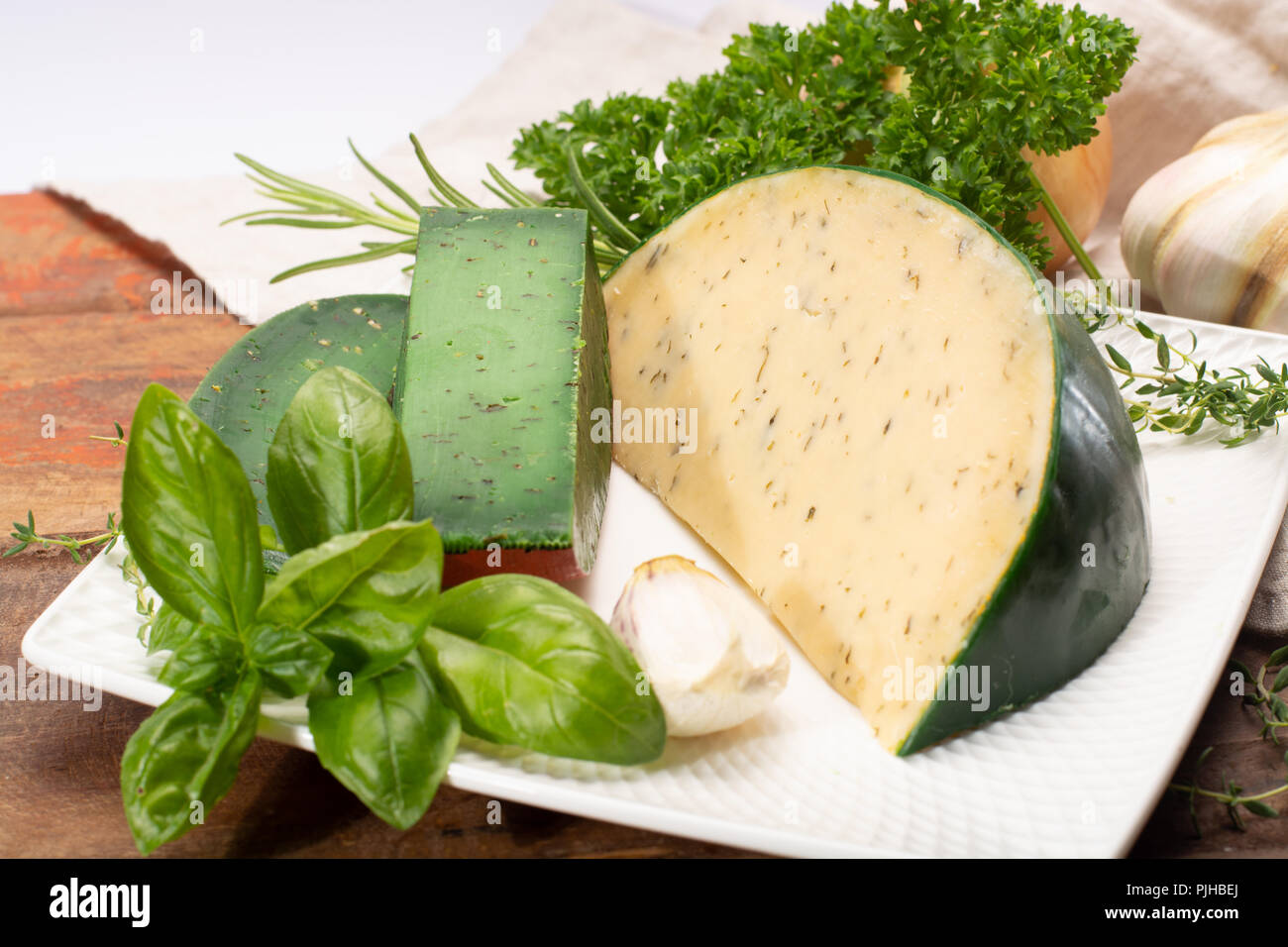 Dutch specialty hard cheese made from cows milk with different spices ...