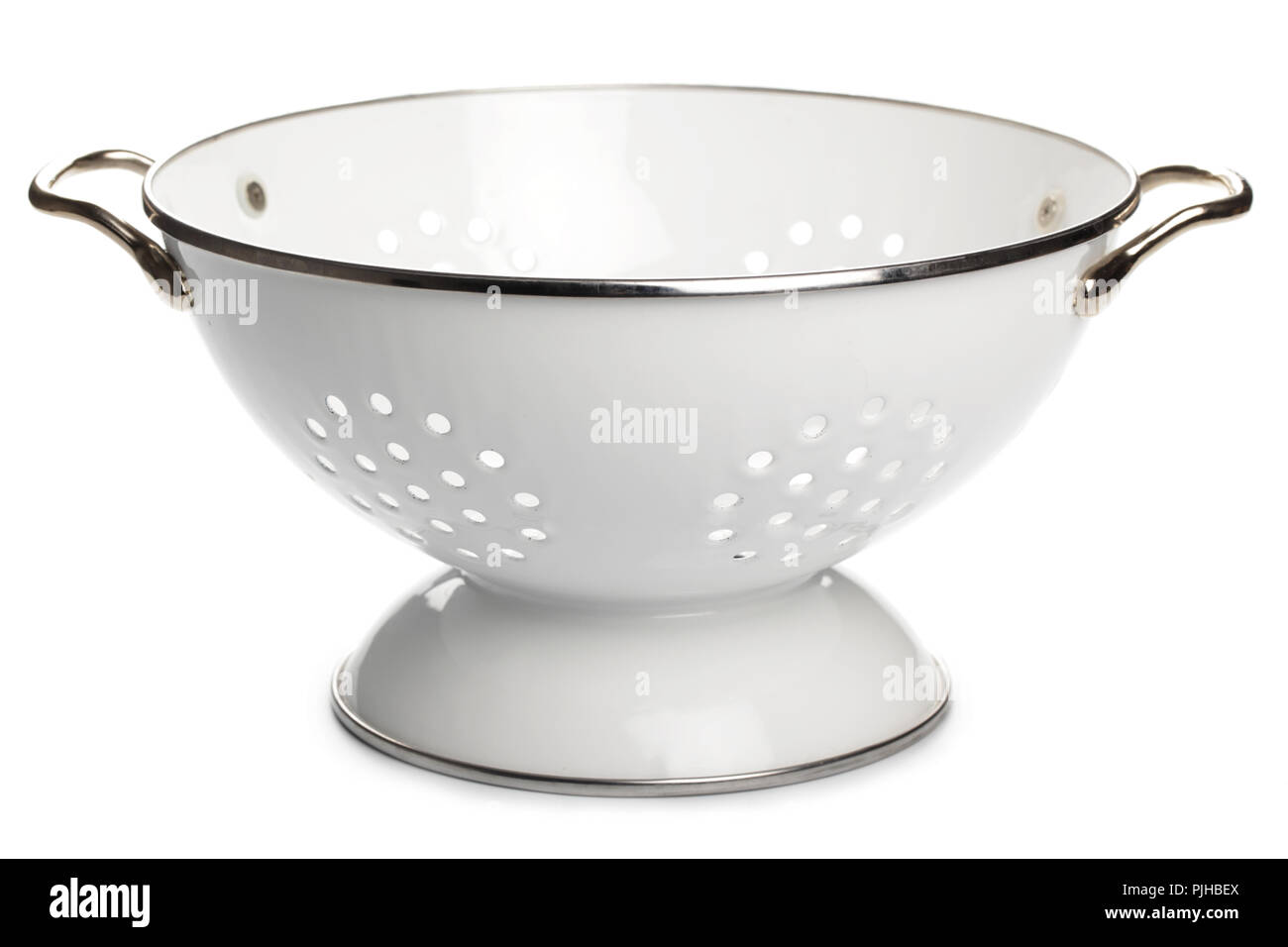 White enamel colander isolated on white background Stock Photo - Alamy