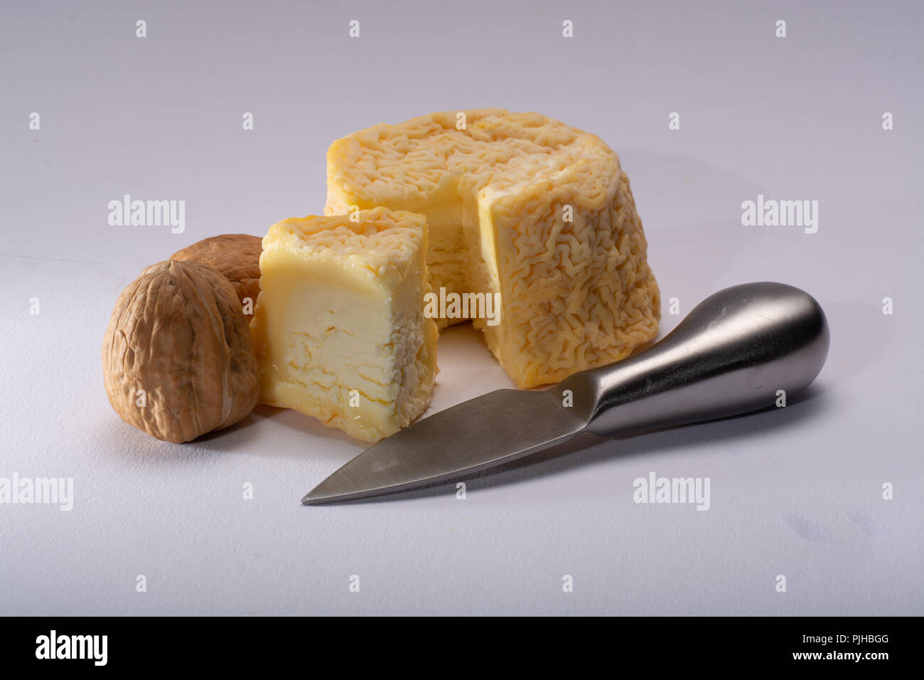 French AOC Langres soft cow crumbly cheese with washed rind structure ...