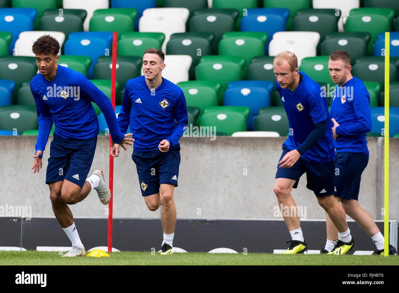 Northern Ireland's (left-right) Jamal Lewis, Gavin Whyte, Liam Boyce ...