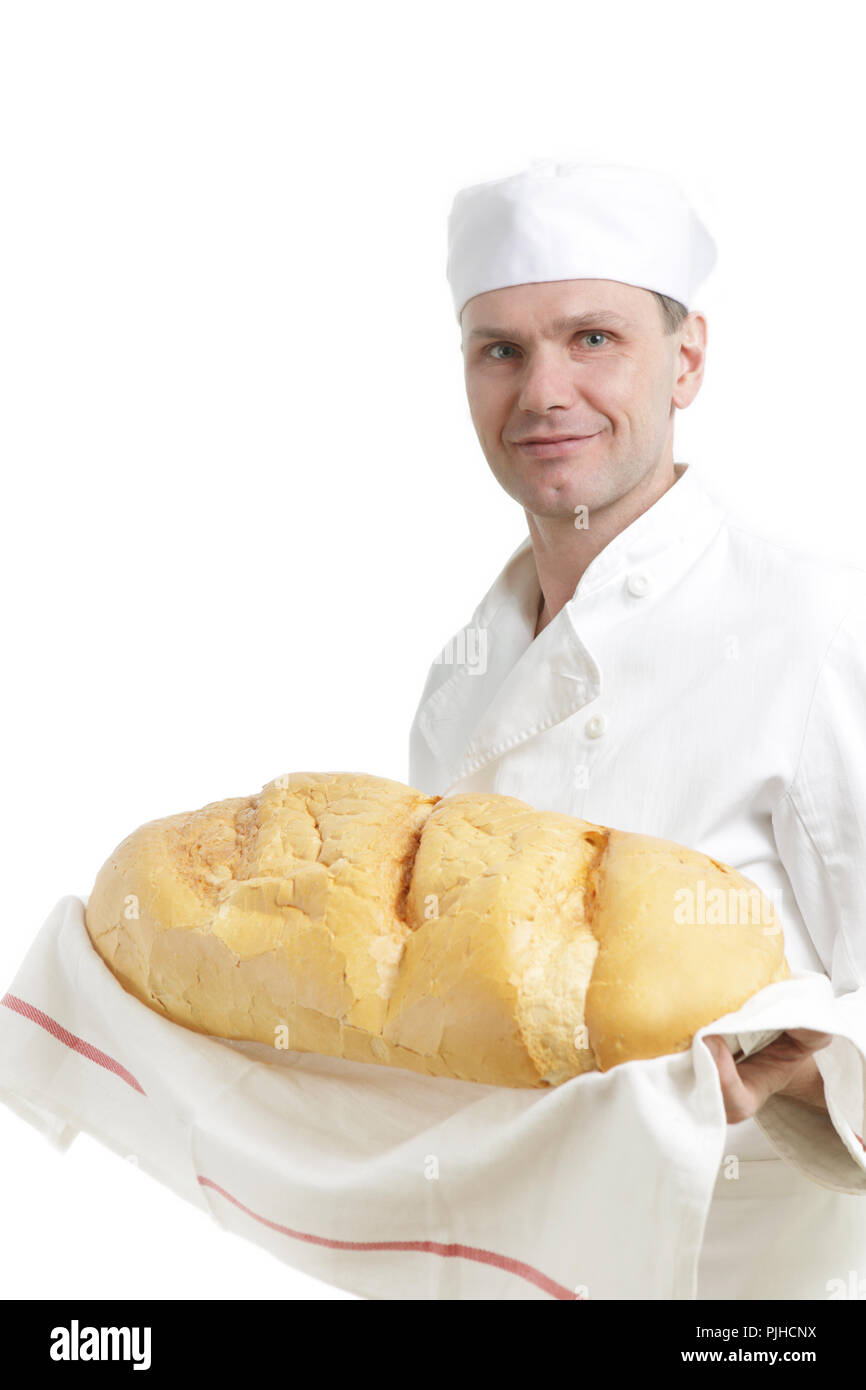 Chef in uniform with big loaf of bread Stock Photo - Alamy
