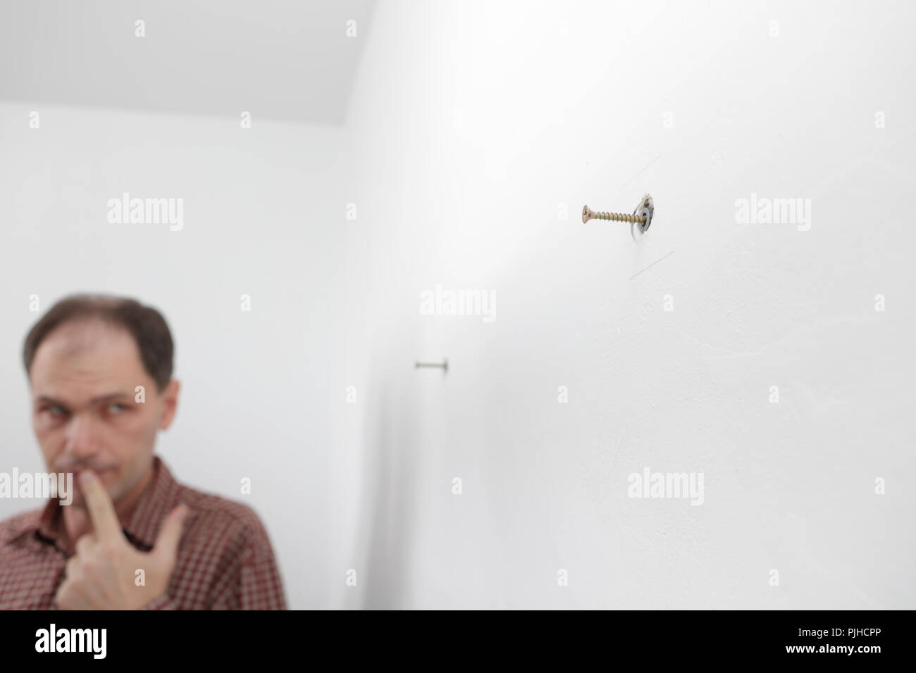 Hole wall mistake hi-res stock photography and images - Alamy