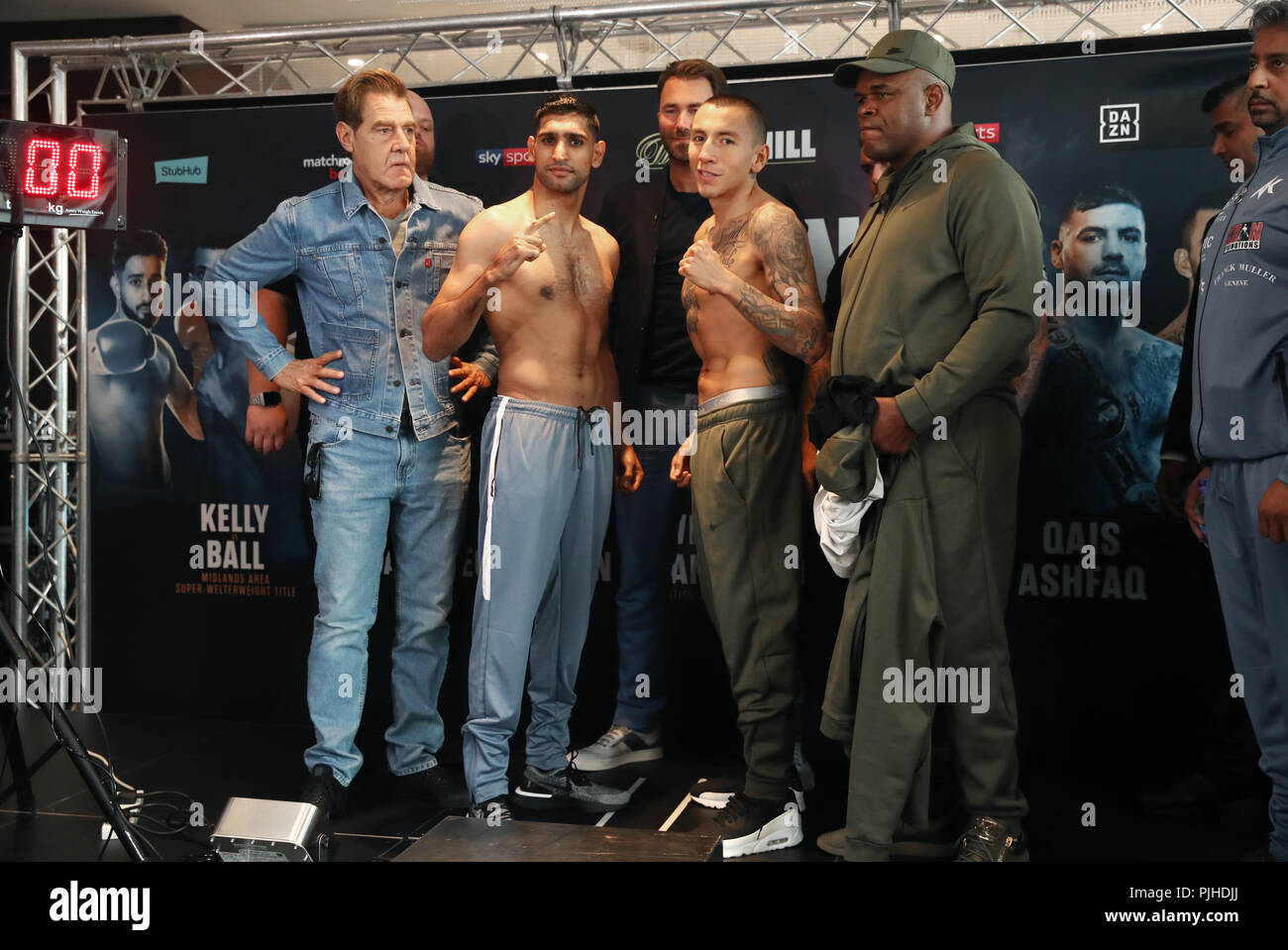 Amir Khan (left) and Samuel Vargas during the weigh in at Arena ...