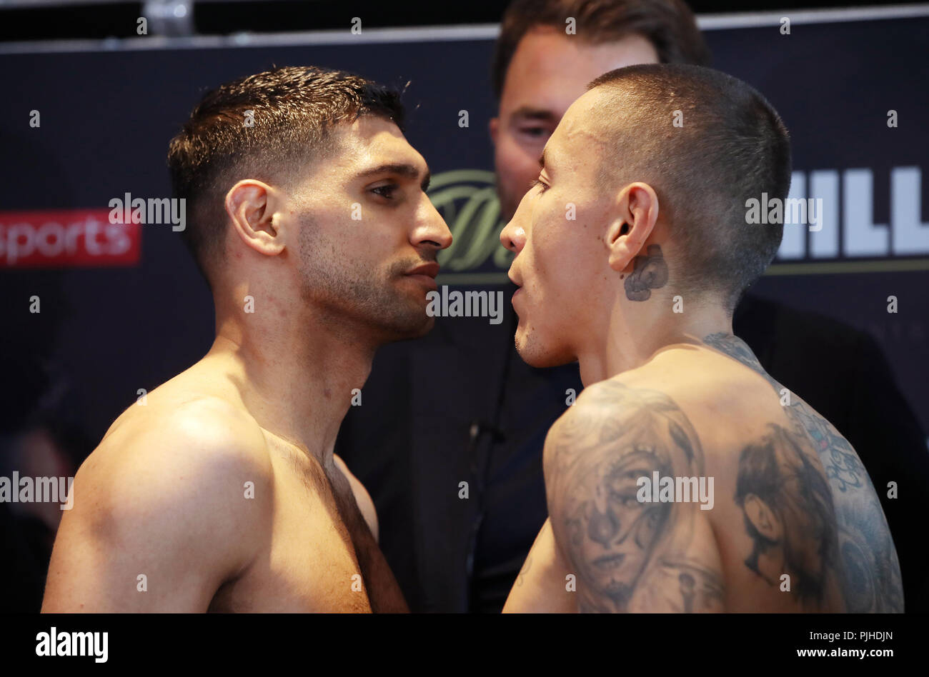 Amir Khan (left) and Samuel Vargas during the weigh in at Arena ...