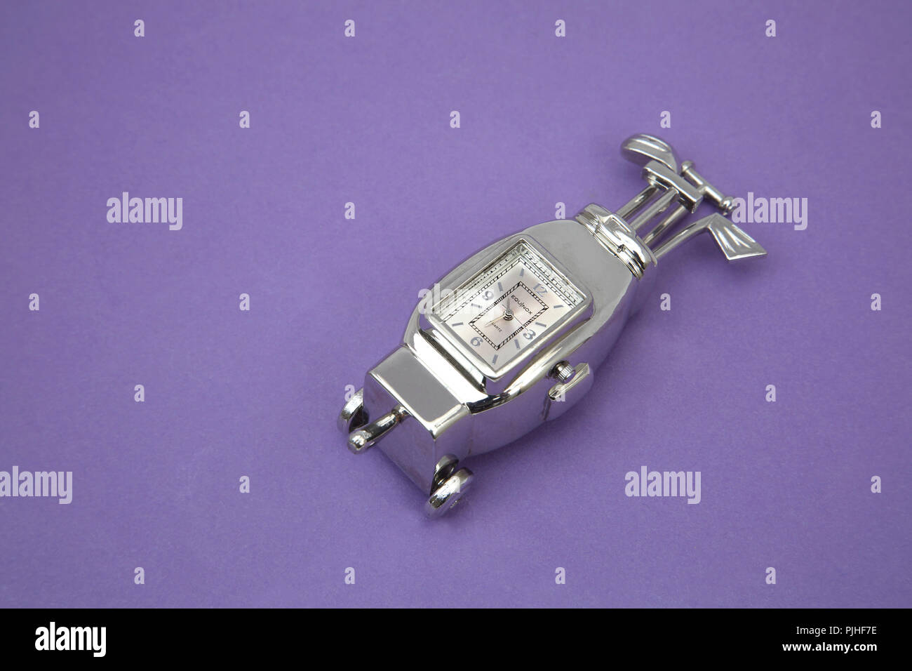 Stainless Steel Equinox Clock in the shape of a Golf Cart Stock Photo ...