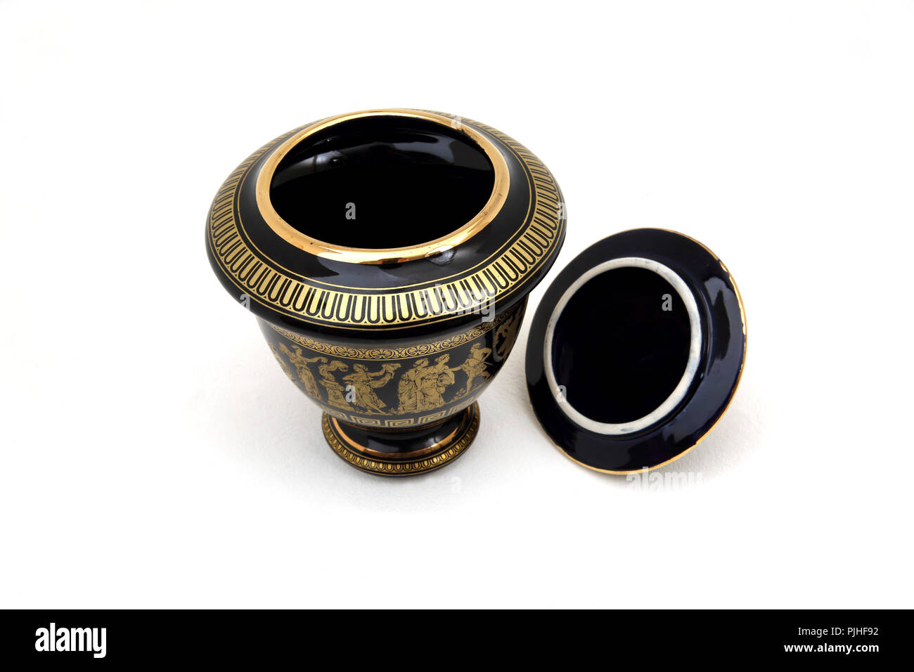 Black Greek Key Urn with 24 Carot Gold Design Stock Photo - Alamy