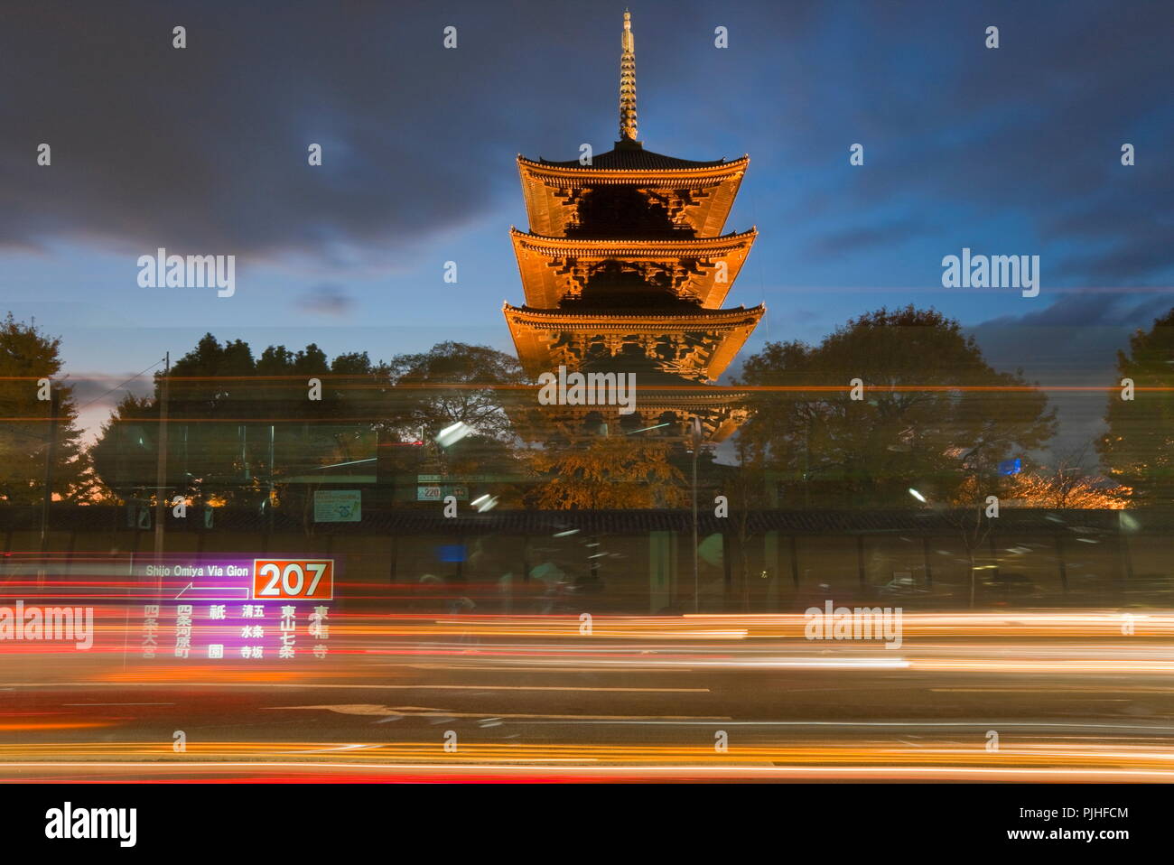 Japan, Kyoto, twilight view showing traffic on Omiya Avenue passing by ...