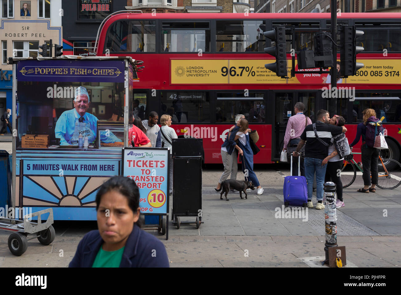 Lovers hug in public hi-res stock photography and images - Alamy