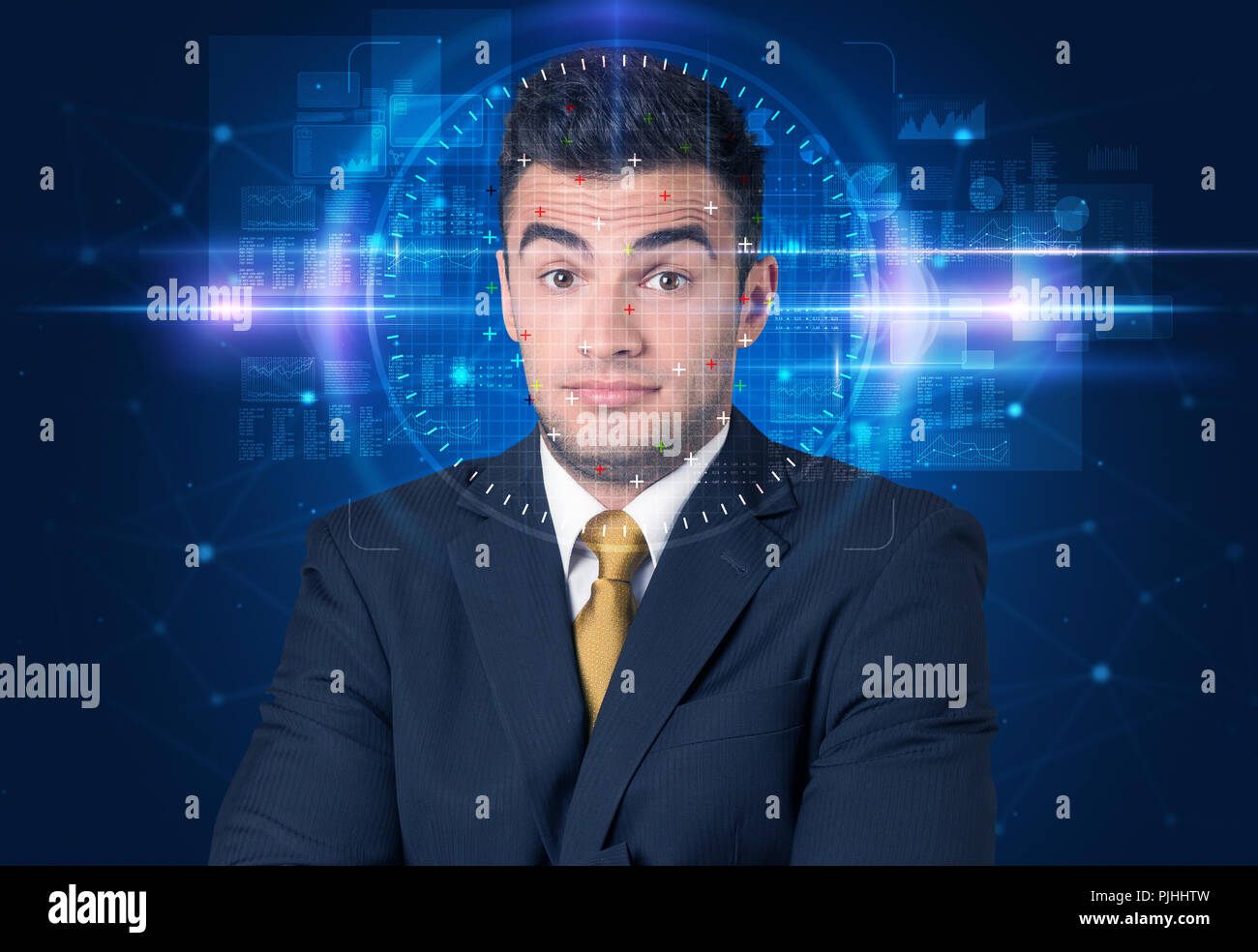 Facial recognition system. Young man on blue background Stock Photo - Alamy