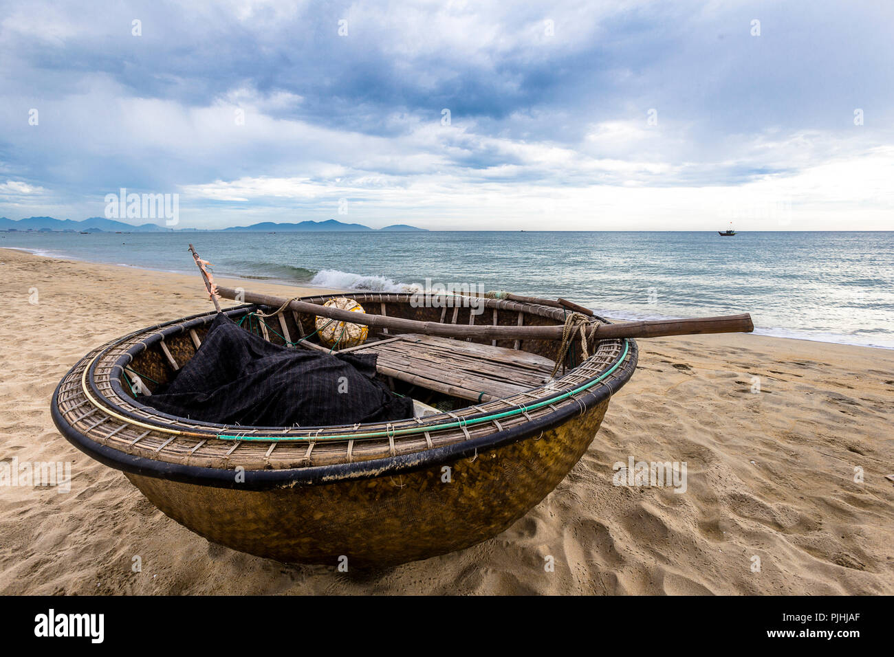 Hoi An, Ang Bang Beach round boat on the sand Stock Photo - Alamy