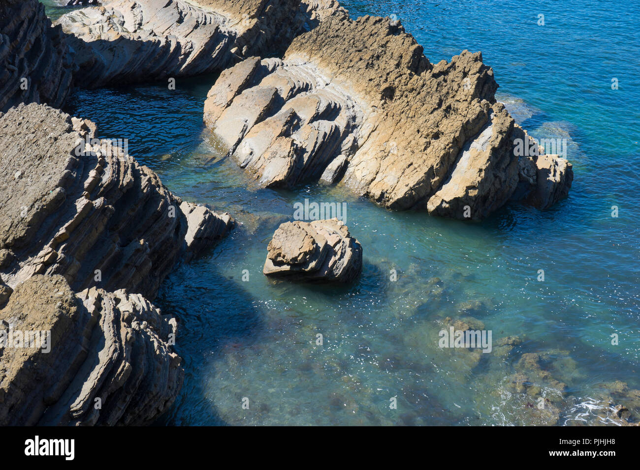cliff with rocks, San Juan Gaztelugatxe island view, basque country ...