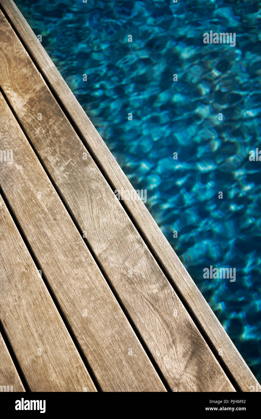 Wooden teak deck of a swimming pool Stock Photo - Alamy