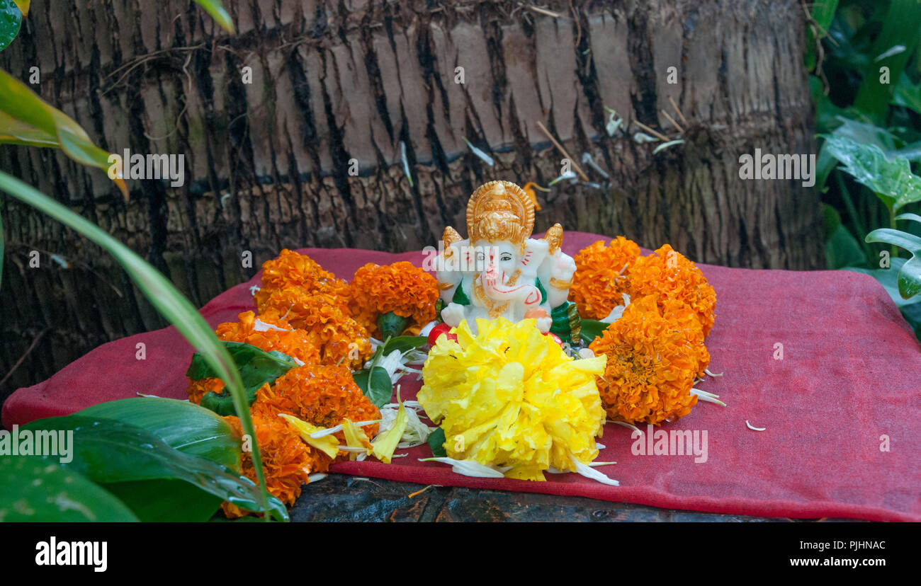 Miniature idol of Lord Ganesha, the Hindu god of wisdom. 10-day Ganpati ...