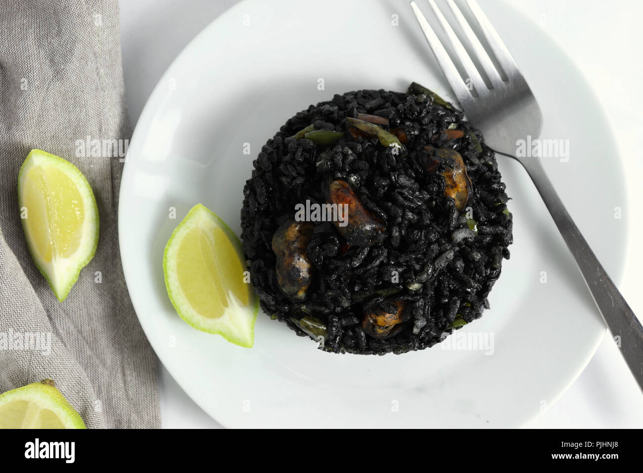 Traditional arroz negro - arròs negre - black rice dish, typical for ...