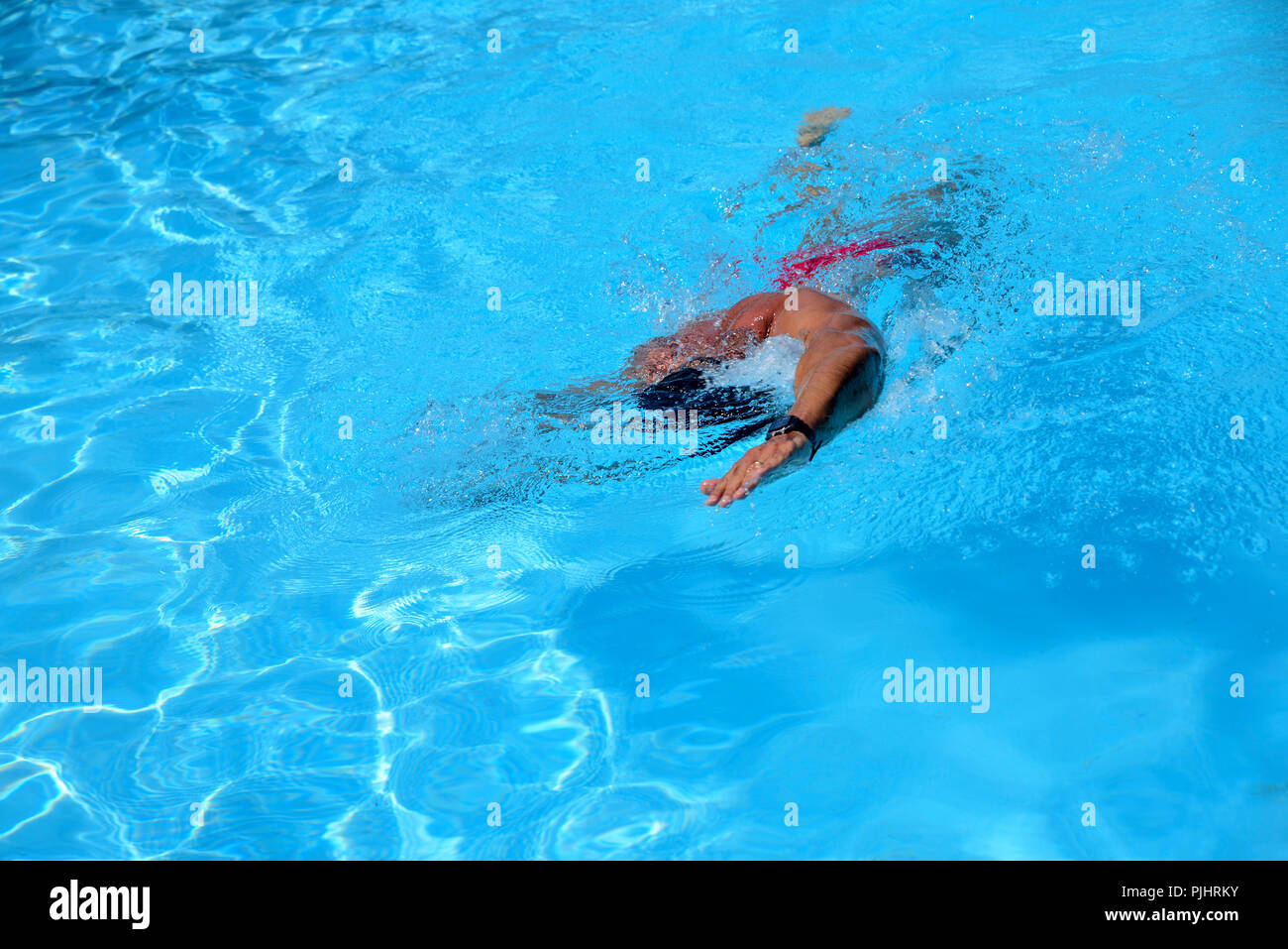 Muscular male swimmer wearing swim hi-res stock photography and images ...