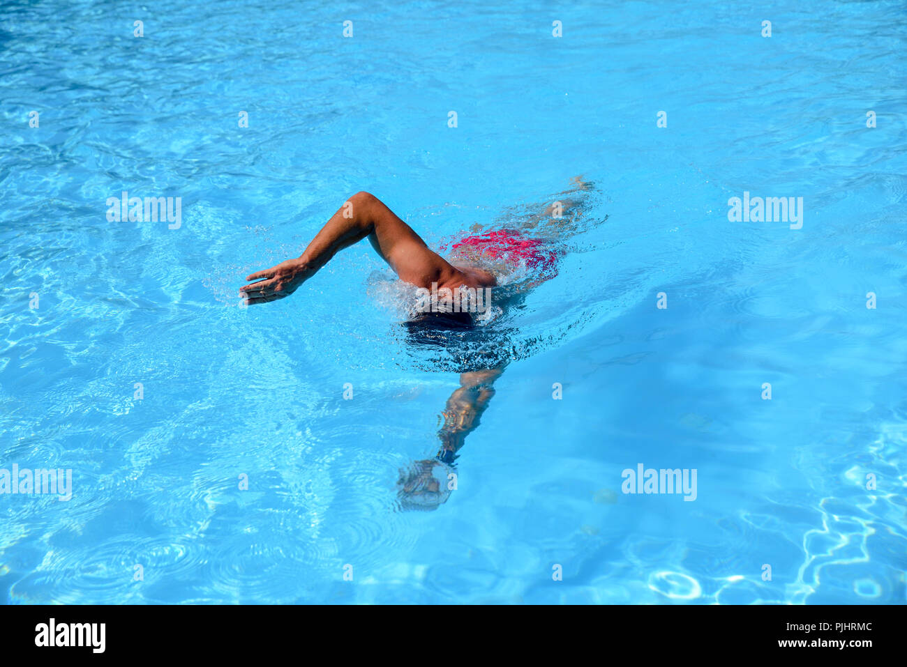Muscular male swimmer wearing swim hi-res stock photography and images ...
