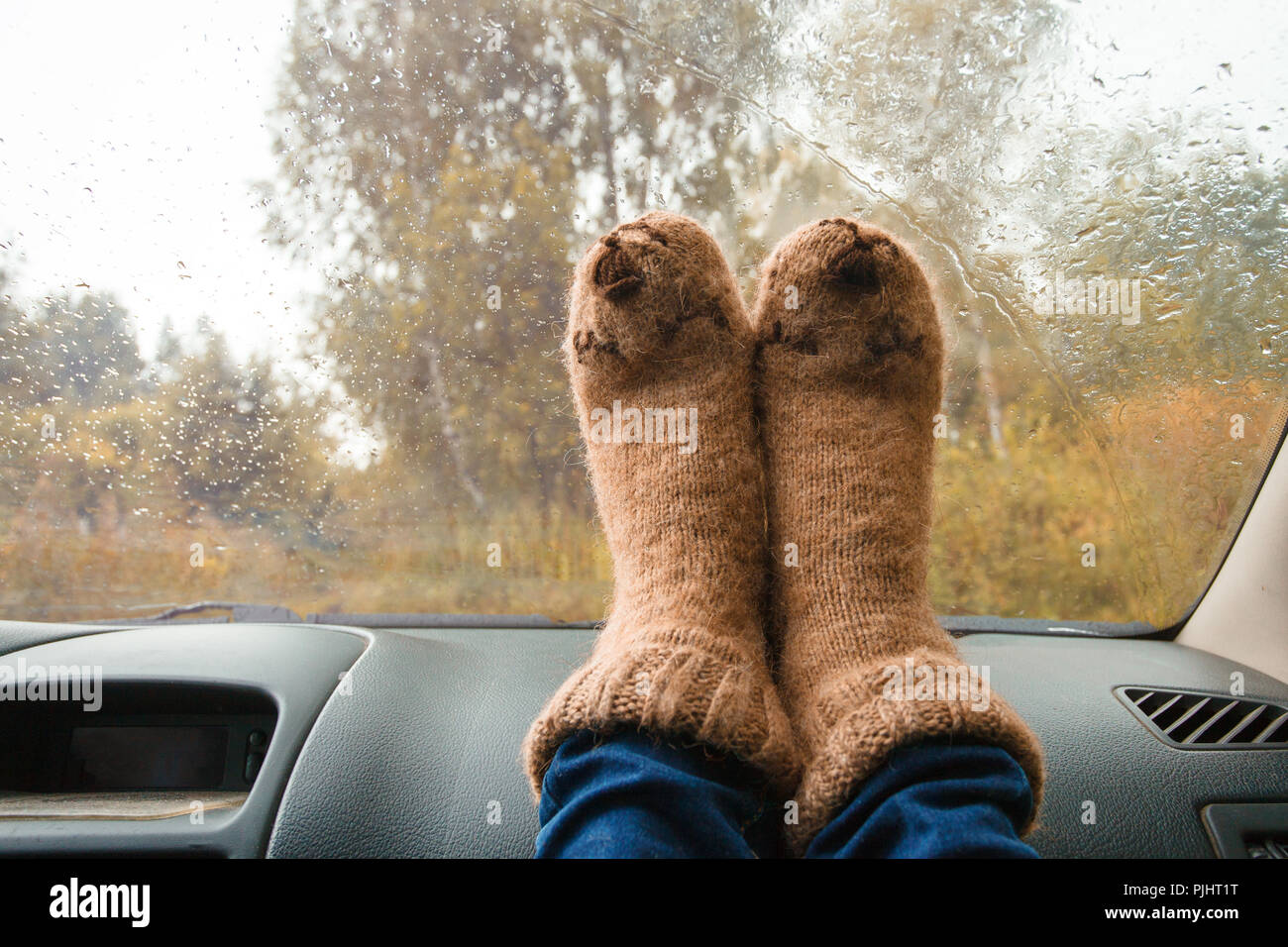Feet on dashboard car on hi-res stock photography and images - Alamy