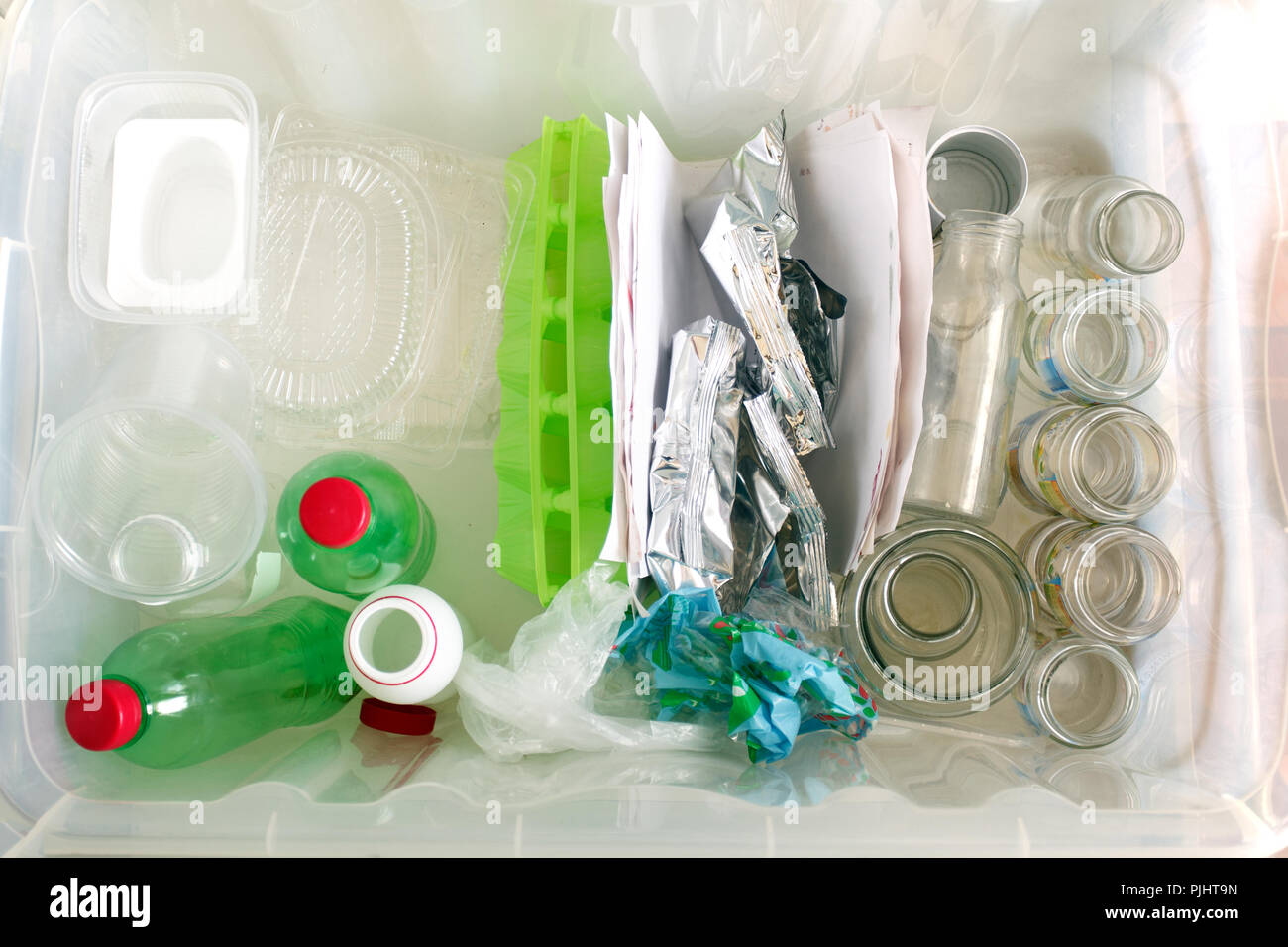 sorting of garbage types. Waste management concept. Top view ...