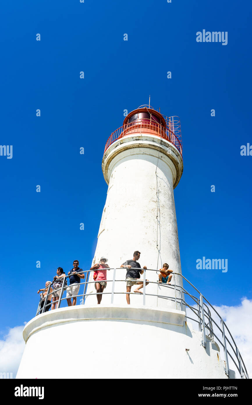 A group of people on the lighthouse, Gosier island, Guadeloupe, France ...