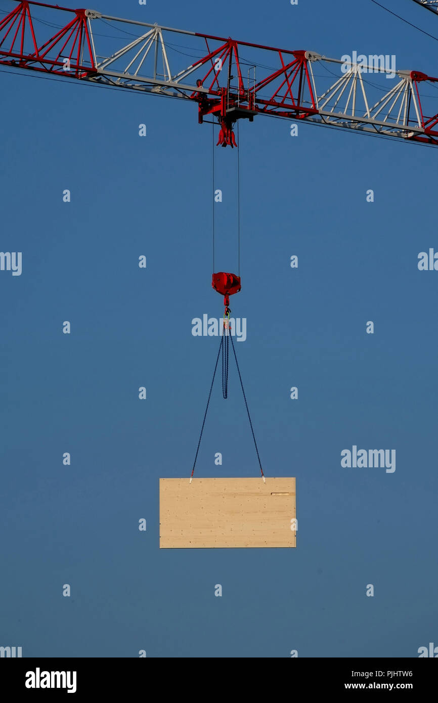 Crane lifting a panel Stock Photo - Alamy