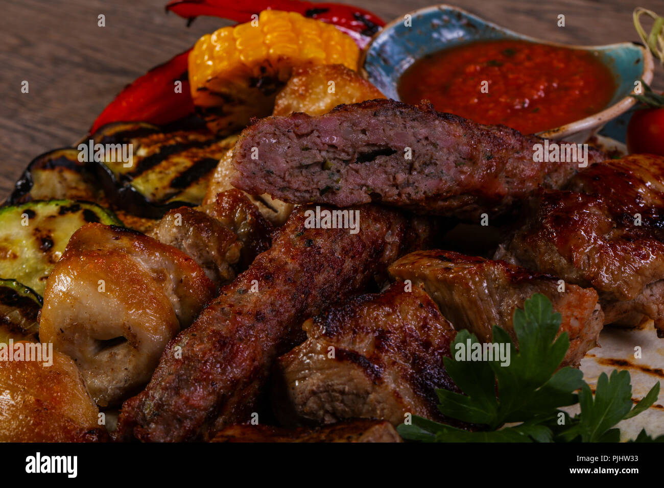 Grilled plate mix assortment meat Stock Photo - Alamy