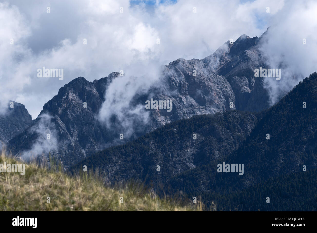 Morning mist rises above the Canadian Rockies Stock Photo - Alamy
