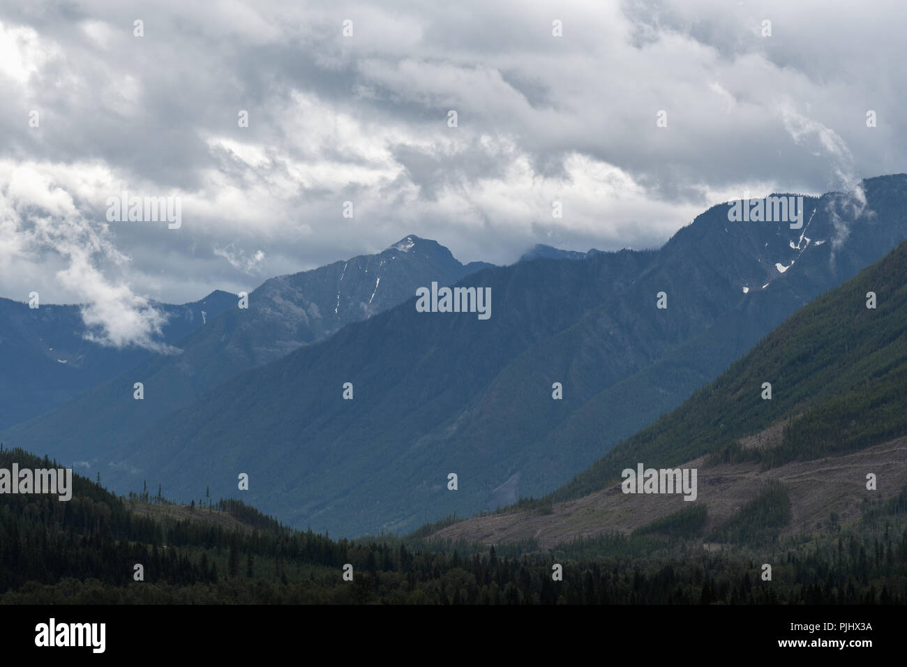 Heavy rain over valley in Canada Stock Photo - Alamy