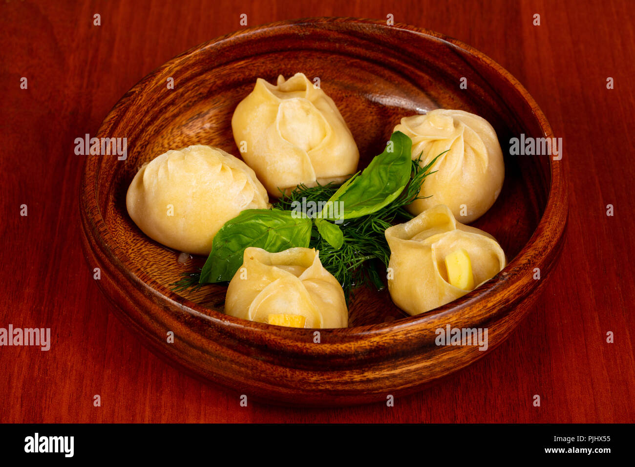Uzbek traditional dumplings - Manti with meat Stock Photo - Alamy