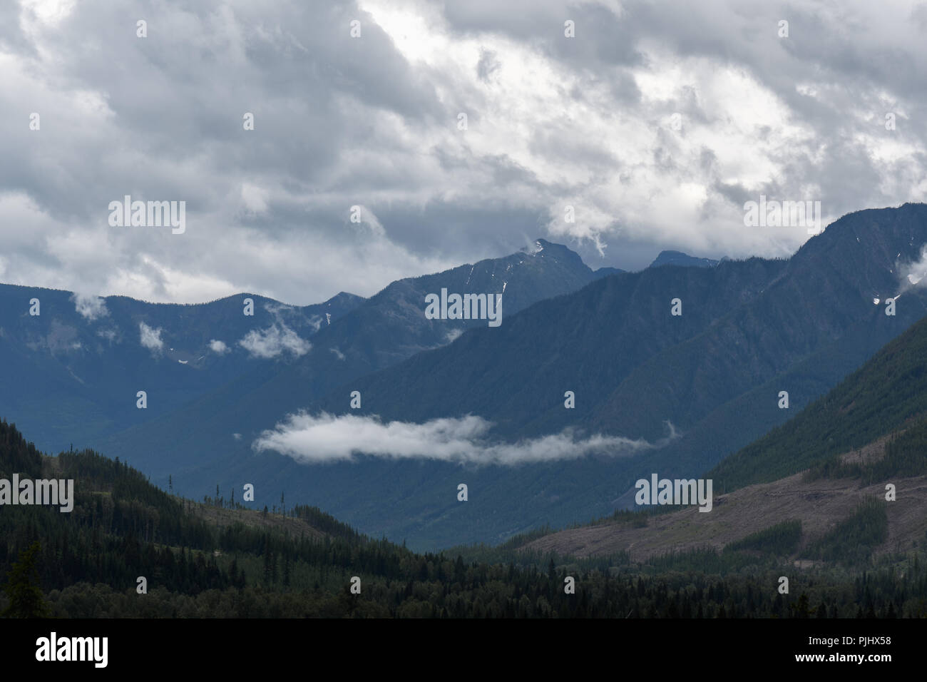 Heavy rain over valley in Canada Stock Photo - Alamy