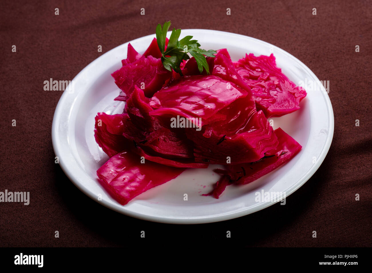 Pickled red cabbage in the plate Stock Photo - Alamy