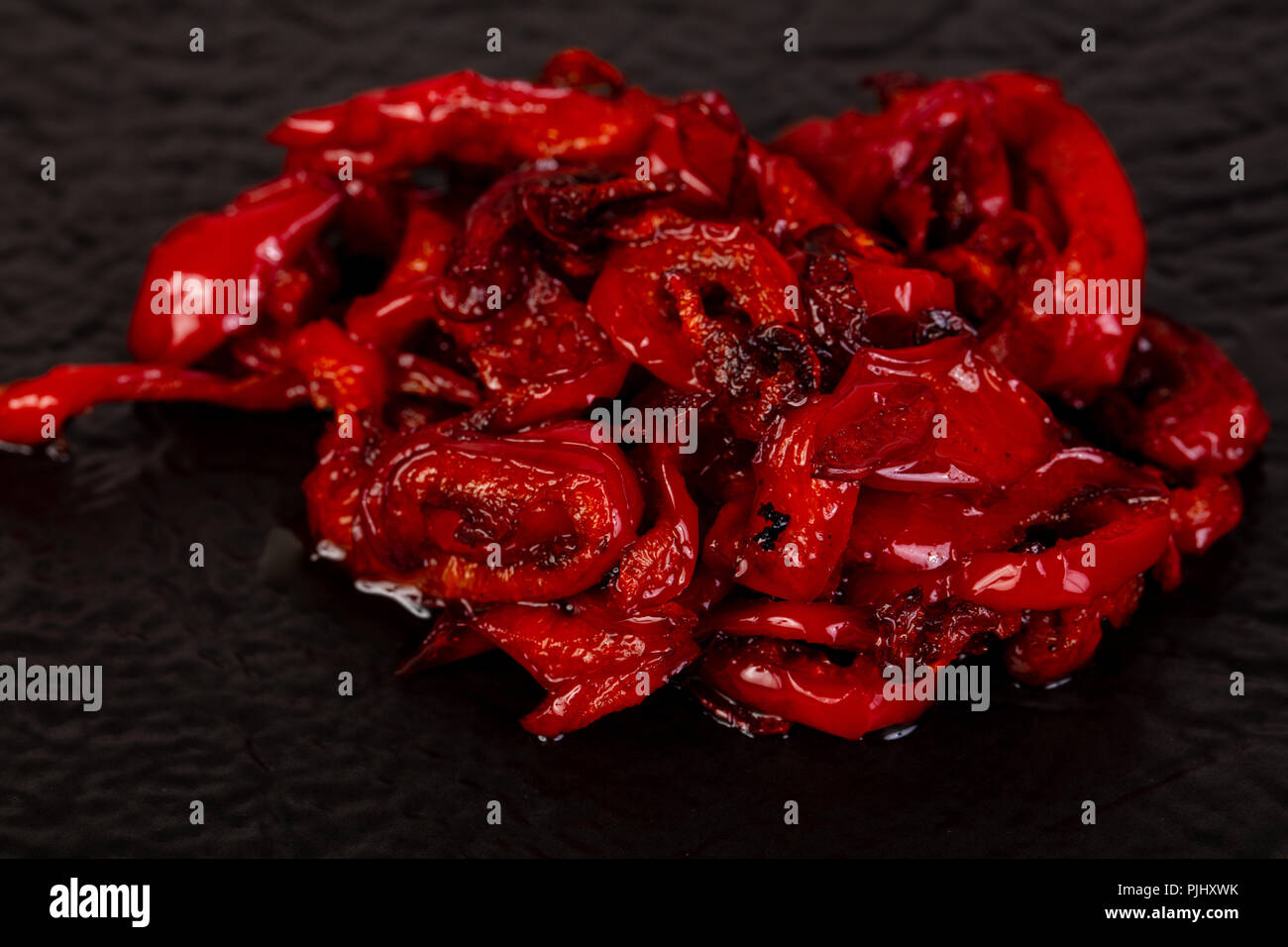 Roasted paprika pepper topping heap Stock Photo - Alamy