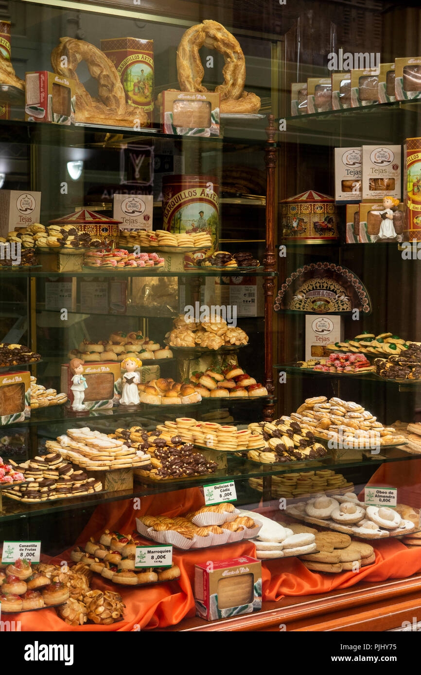 Spain, Cadiz, Calle Compania, biscuits displayed in panaderia (baker’s ...