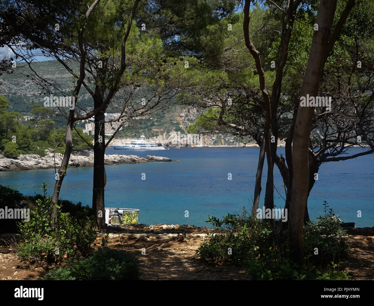 View of a beautiful rock beach in Lokrum island in a sunny summer day ...