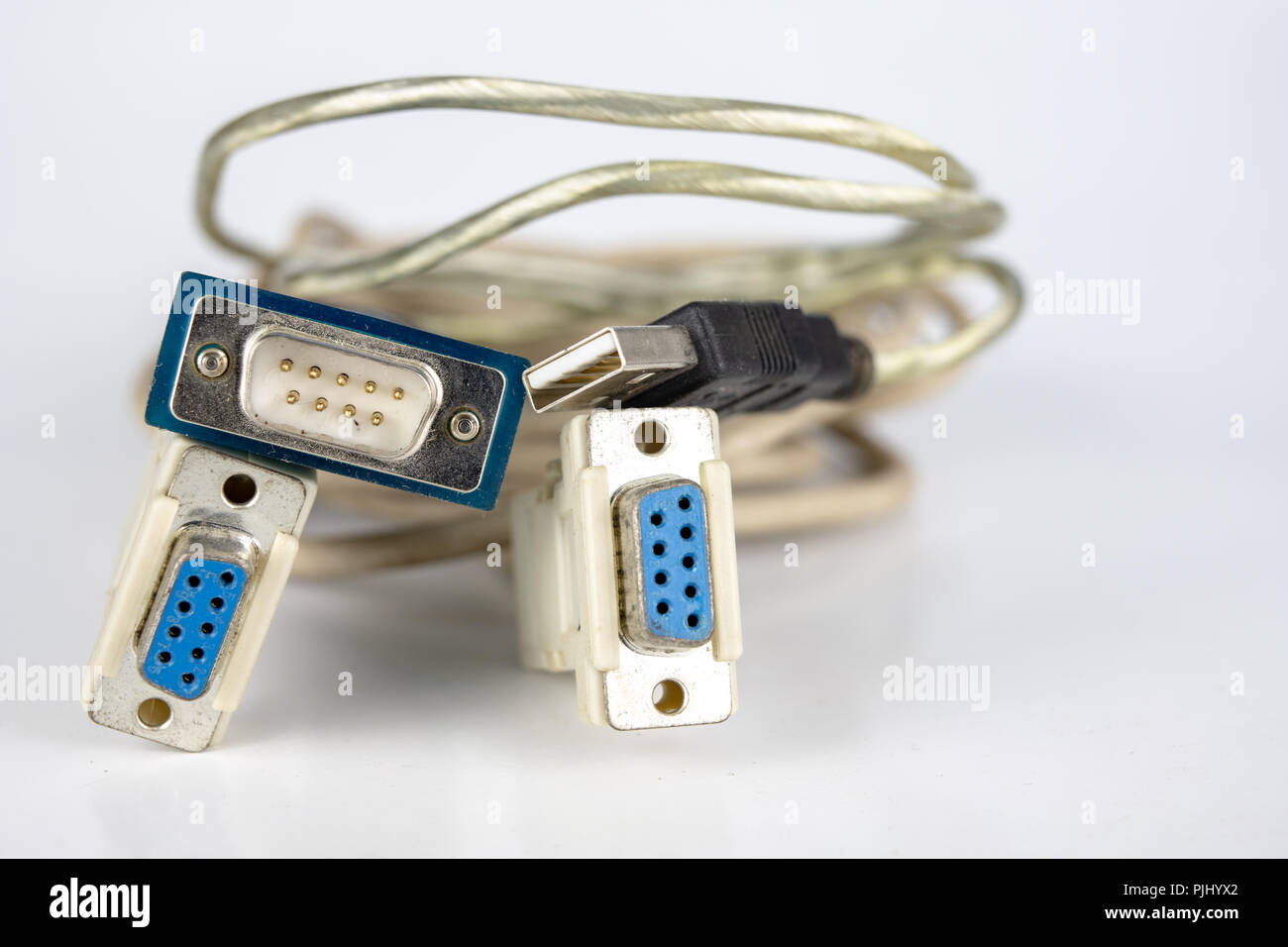 Old PC cables on a white table .. Com and lpt connectors for old ...