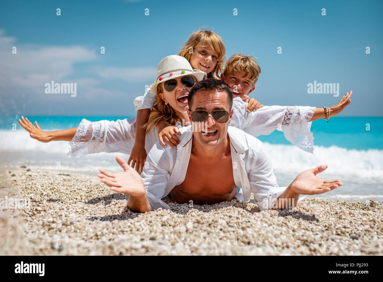 Kids having fun at the beach hi-res stock photography and images - Alamy