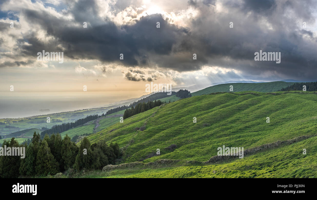Clouds Over The Green Hills Of The Azores Stock Photo - Alamy