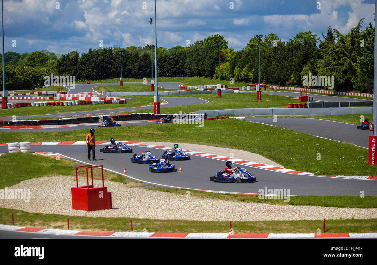 kids driving karts on a track Stock Photo - Alamy