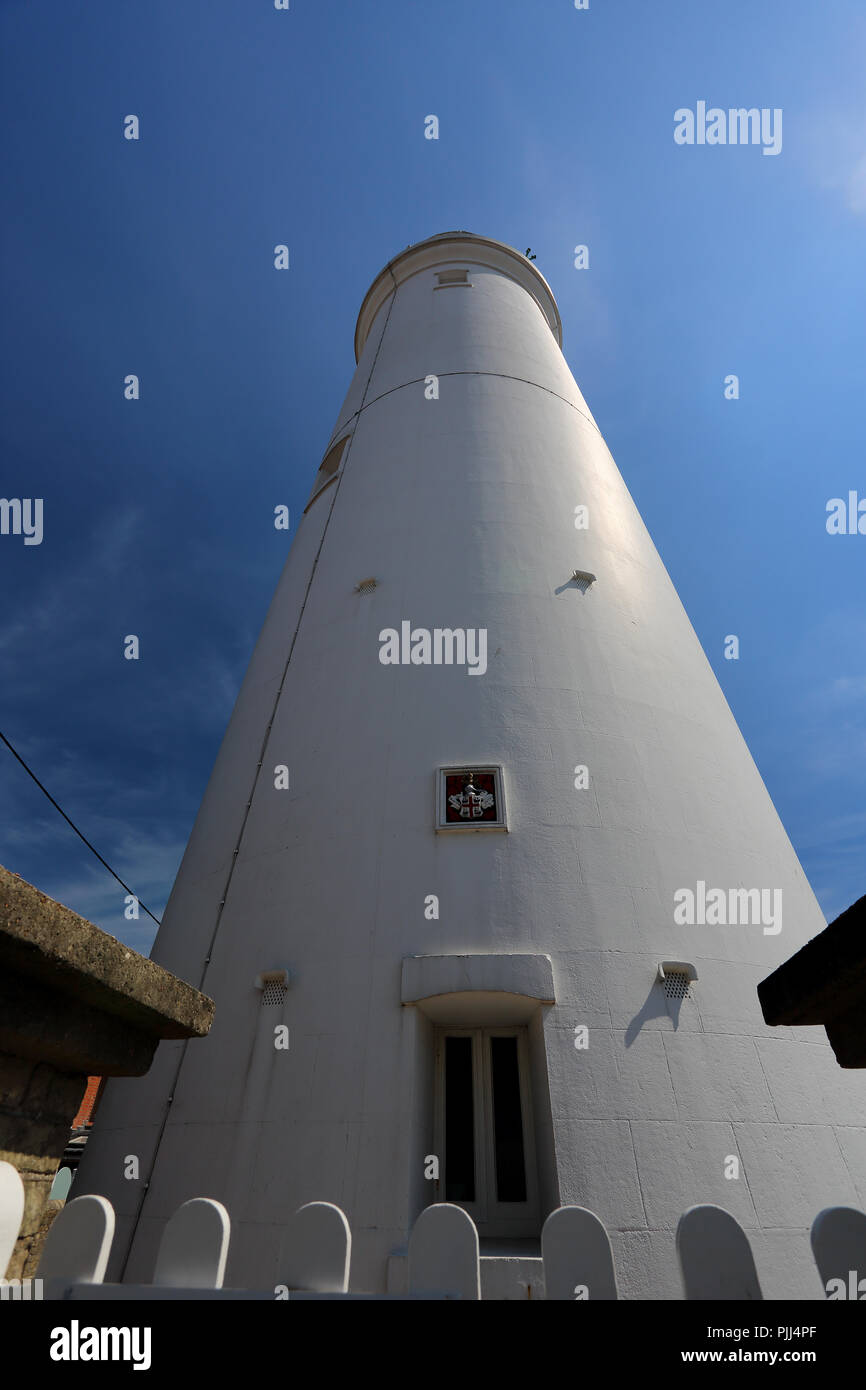 The Trinity House Lighthouse towers above local houses at Southwold ...