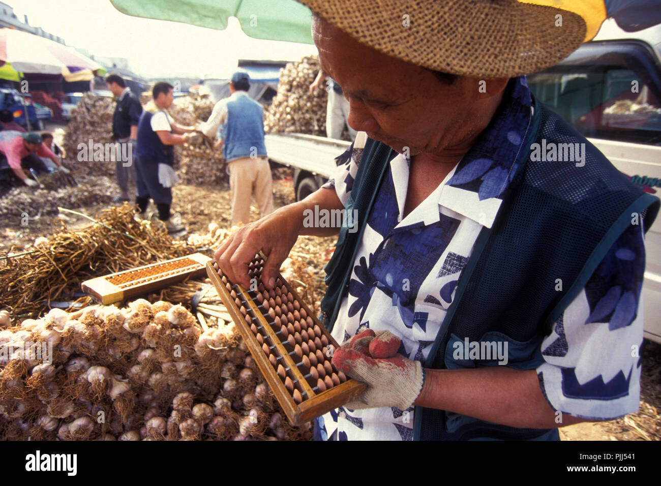 garlic in a shop on a market in the city of Seoul in South Korea in ...