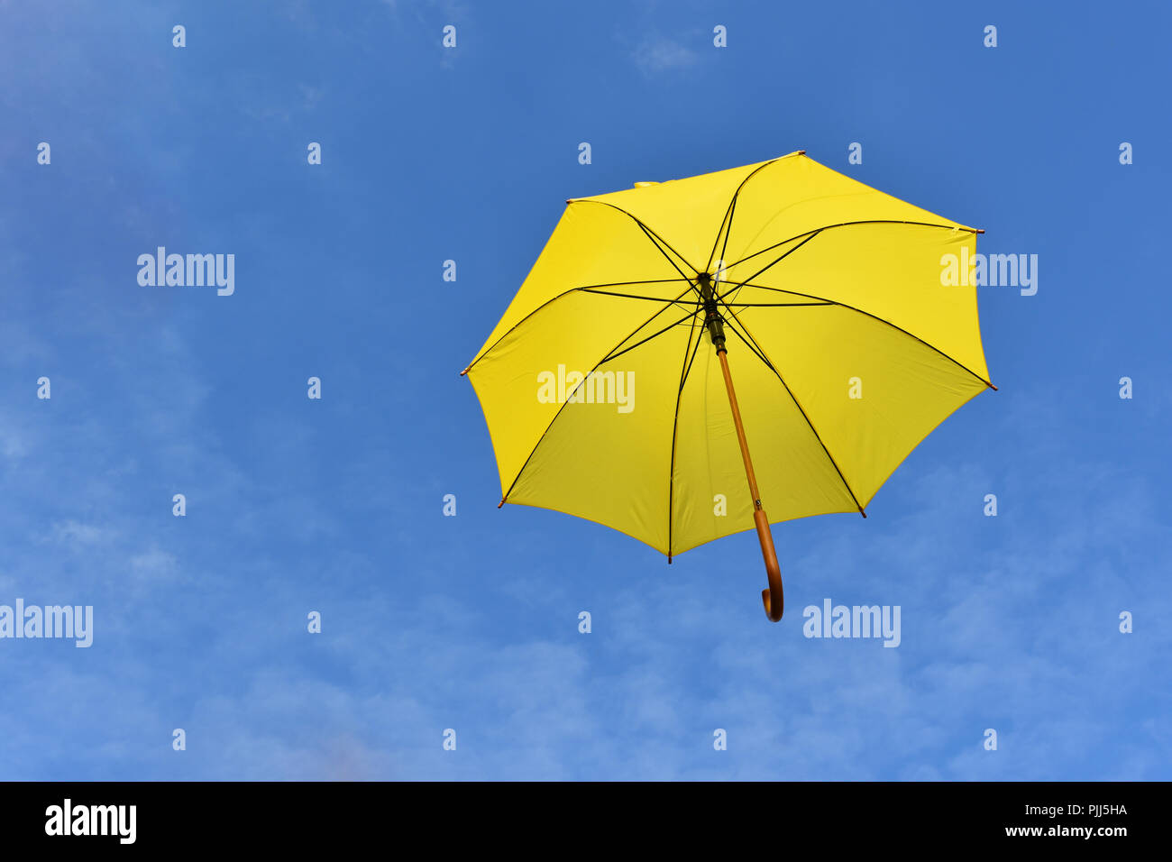 Flying umbrella hi-res stock photography and images - Alamy