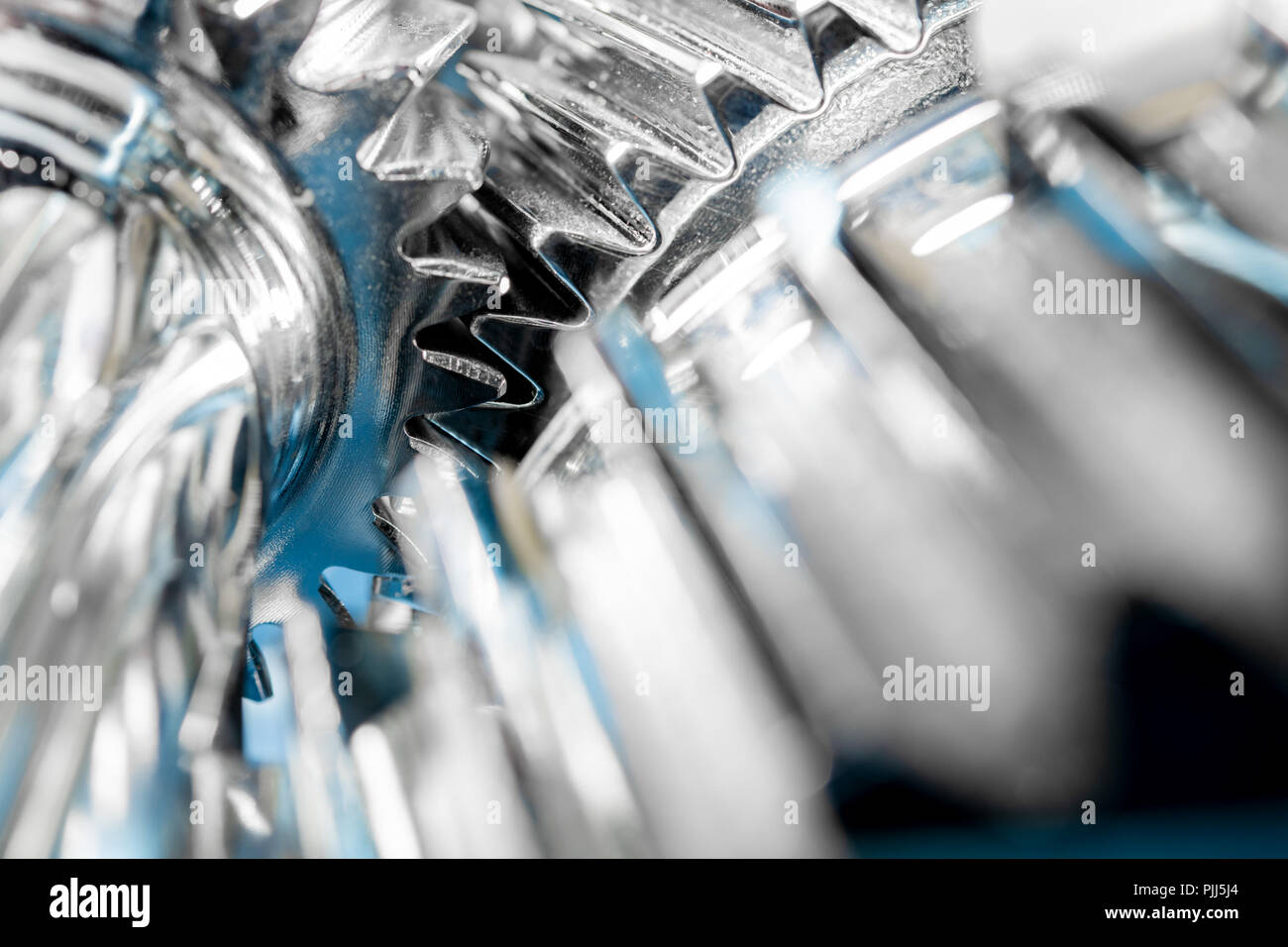 Close up of Chrome Gears Stock Photo - Alamy