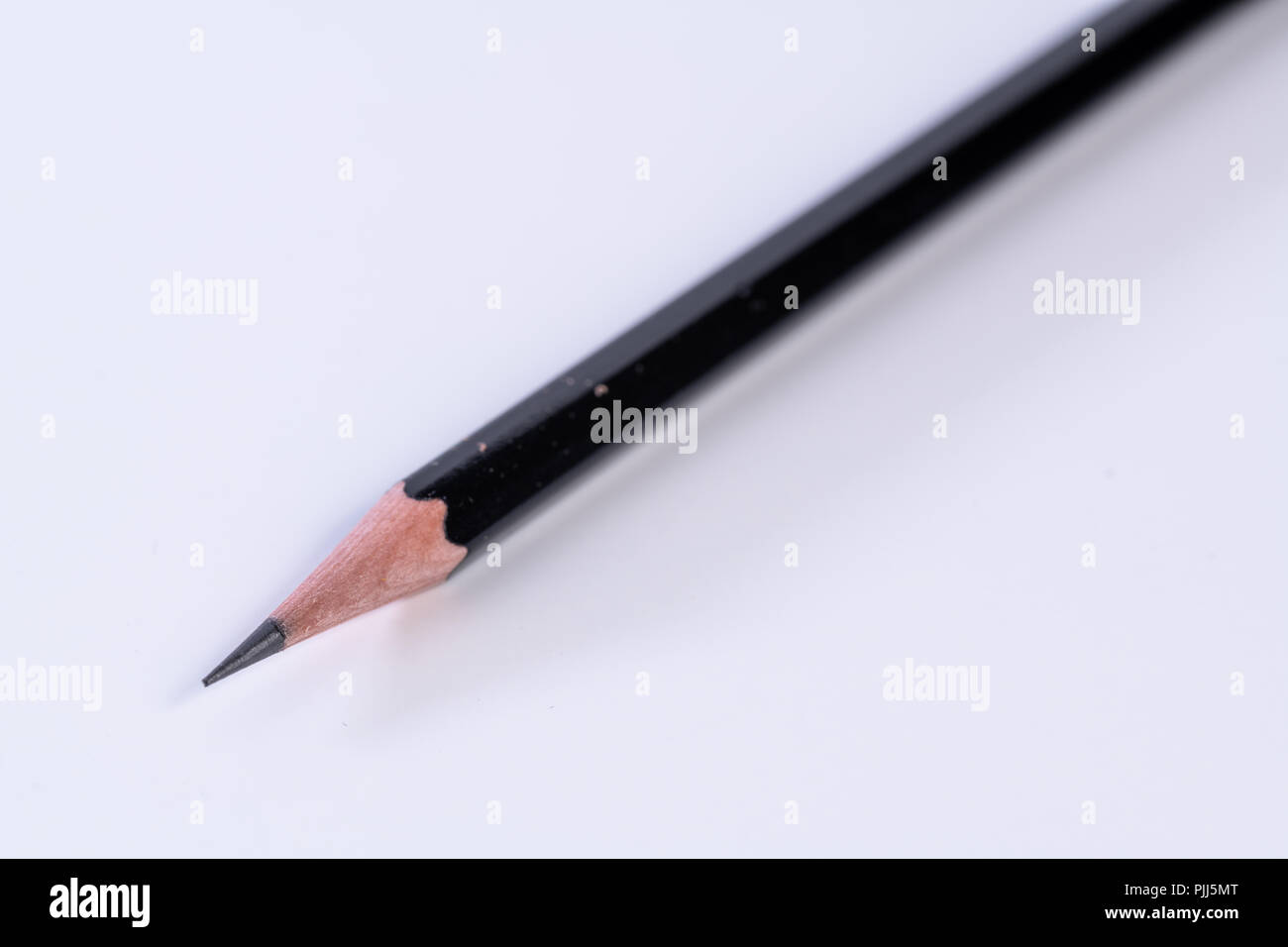 Single isolated black lead graphite pencil with a white background ...