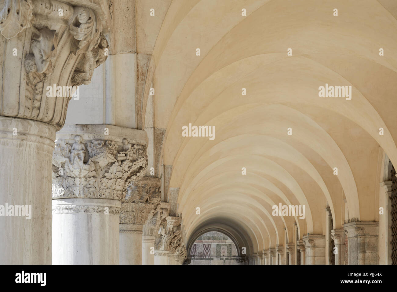 Ancient, white arcade ceiling and capitals in Venice, Italy Stock Photo ...
